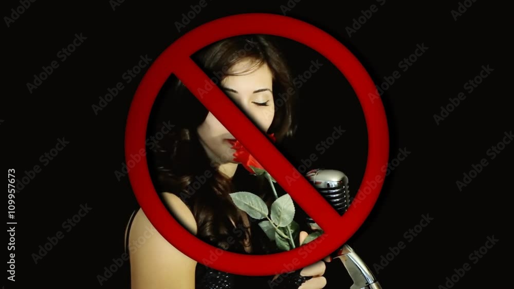 A big red stop sign appears on a scene: a classy young woman singing on ...