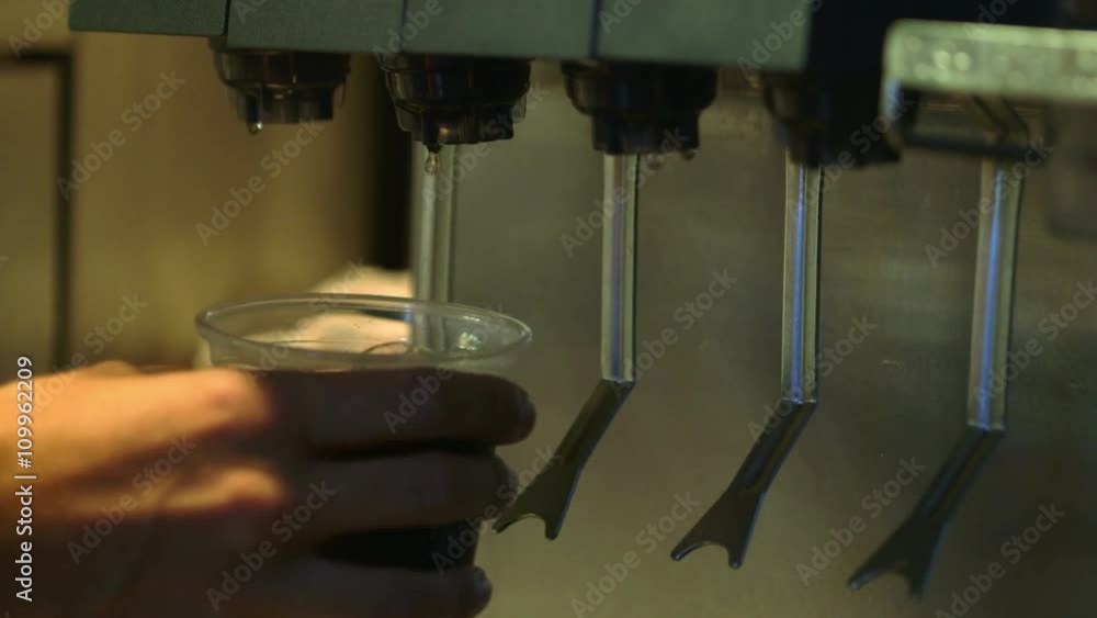 Soft drink dispensing from a soda fountain dispenser popular in fast ...