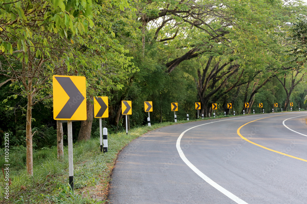 Poster The road curve with street signs reflex light. – Wall Art ...