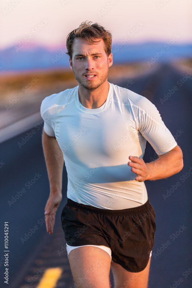 Athlete endurance runner man long distance running with focus and ...
