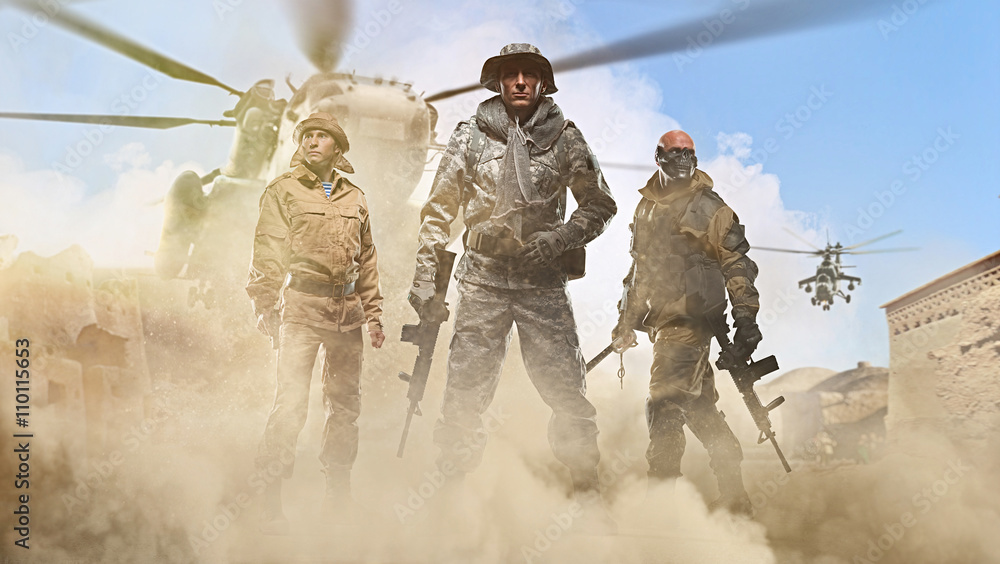 Three special forces men holding a machine gun on the background of the ...