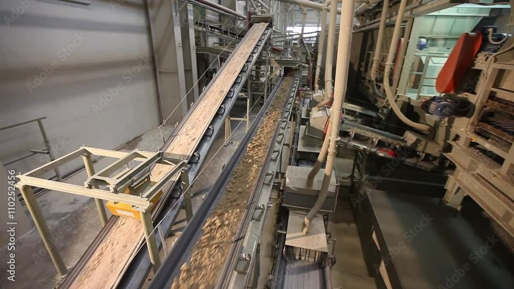 Ð¡onveyor belt on factory. Transportation of clay on the conveyor ...