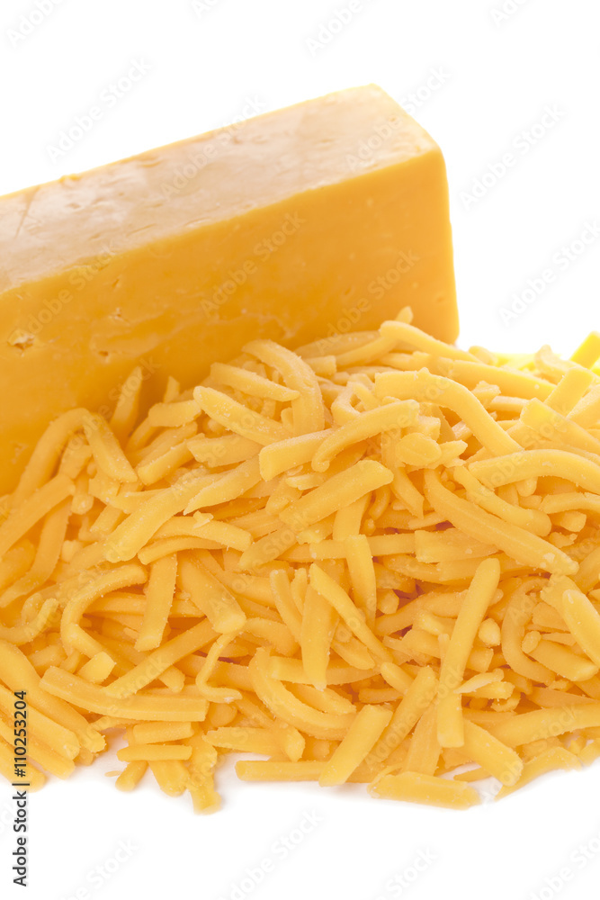 grated bar of cheddar cheese Stock Photo | Adobe Stock
