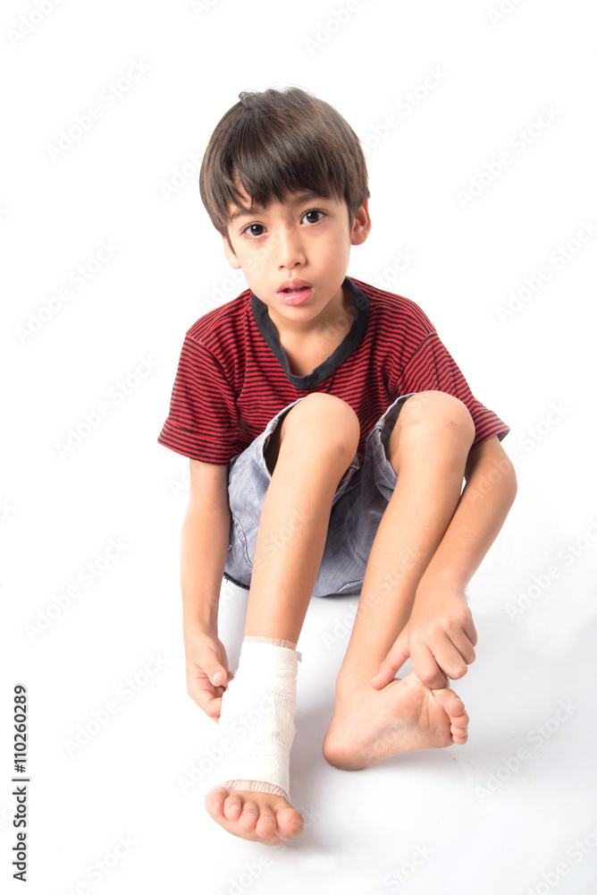 Little boy has an accident with his leg need bandage for first aid ...