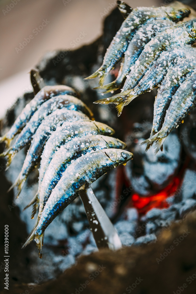 Fish Espetos Preparation. Espetos - Skewer With Sardines In Open Stock ...