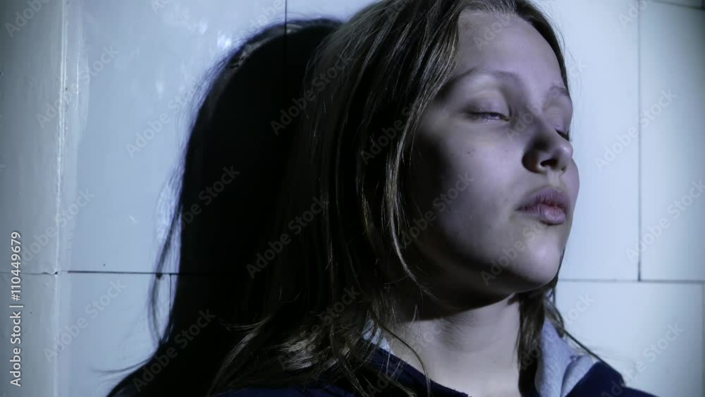 Teen girl. Drug addiction. Depressed face of a teen girl with overdose ...