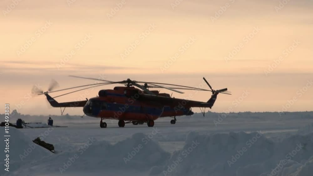 Take off the helicopter with ice airfield. ICE CAMP BARNEO, ARCTIC ...