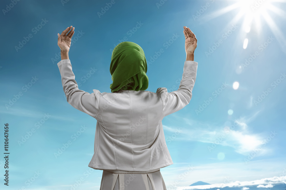 Back view of muslim woman praying Stock Photo | Adobe Stock