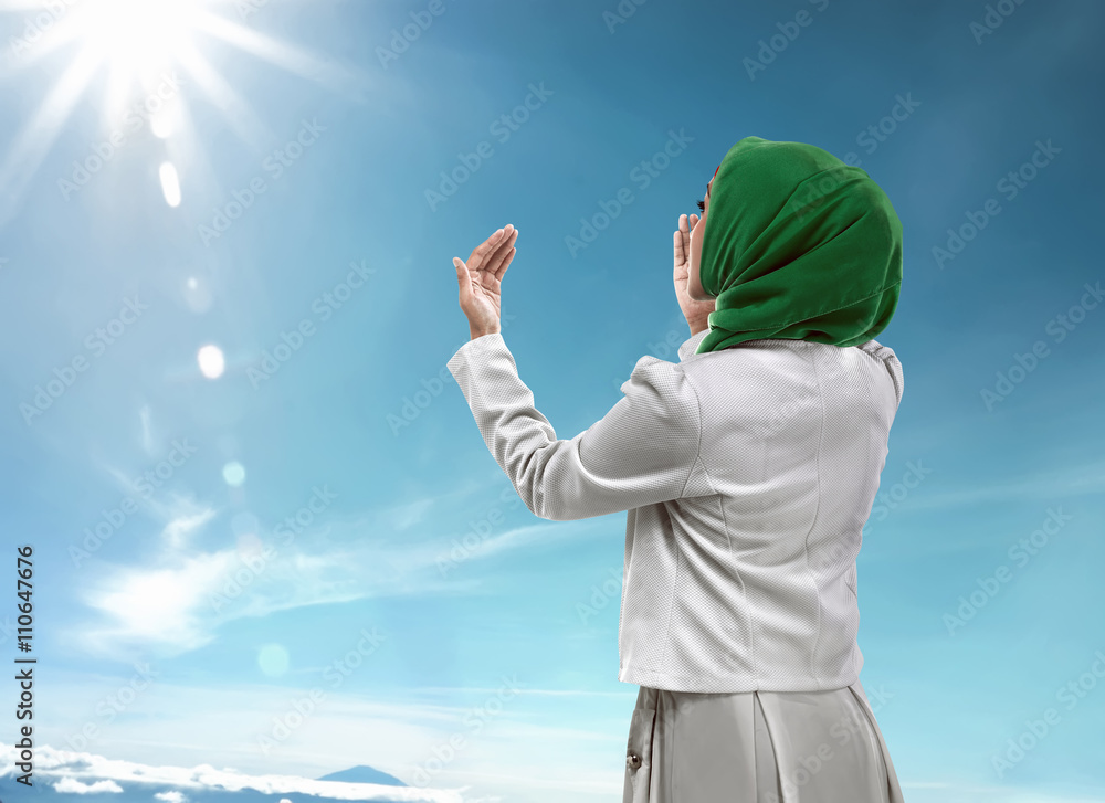 Back view of muslim woman praying Stock Photo | Adobe Stock