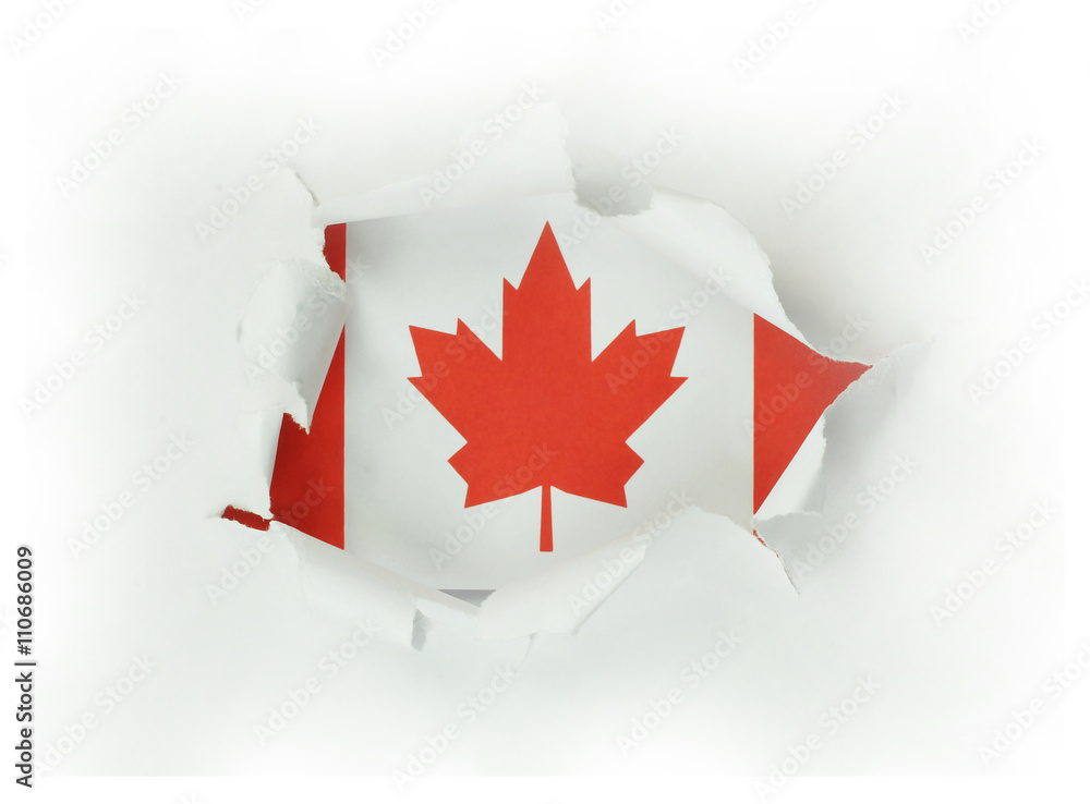 Torn paper forms an elliptical shape filled with a red and white ...