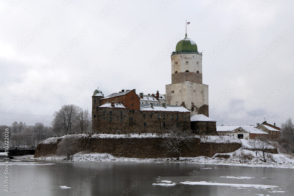 Vyborg castle in winter, was founded by Swedes in 1293 on a island in ...