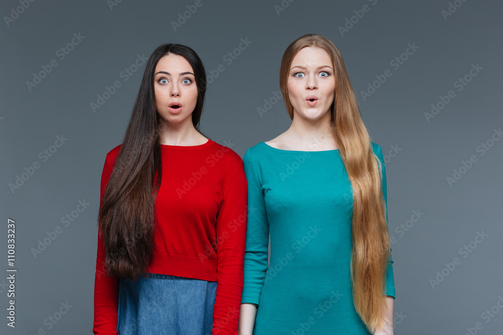 Two amazed girl Stock Photo | Adobe Stock