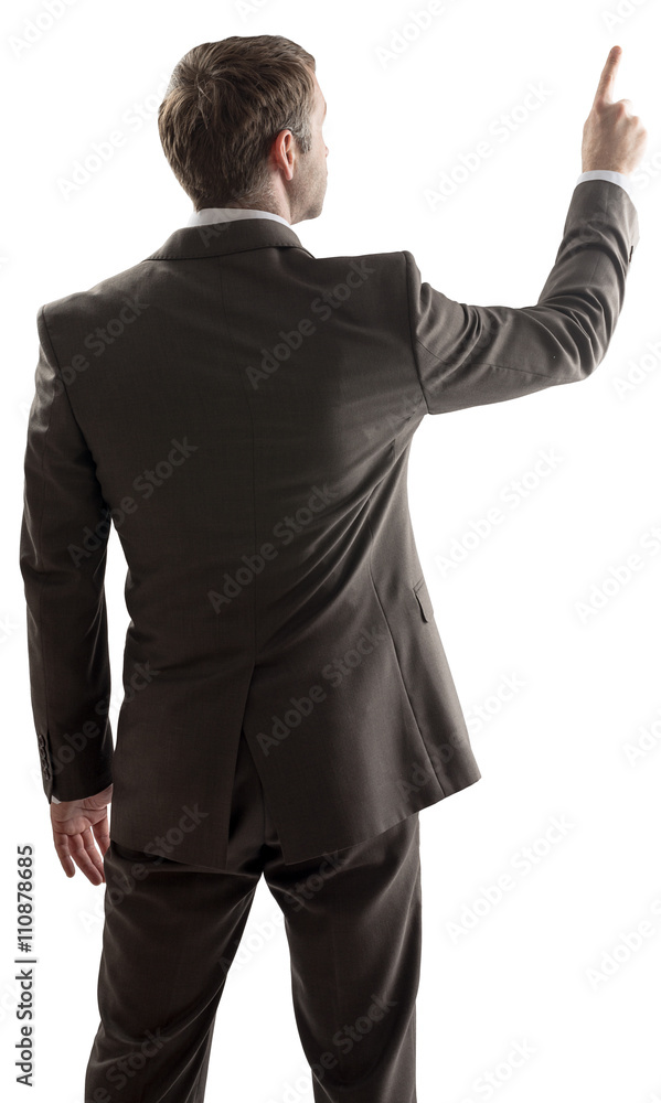 Rear view of businessman pointing at copy space Stock Photo | Adobe Stock