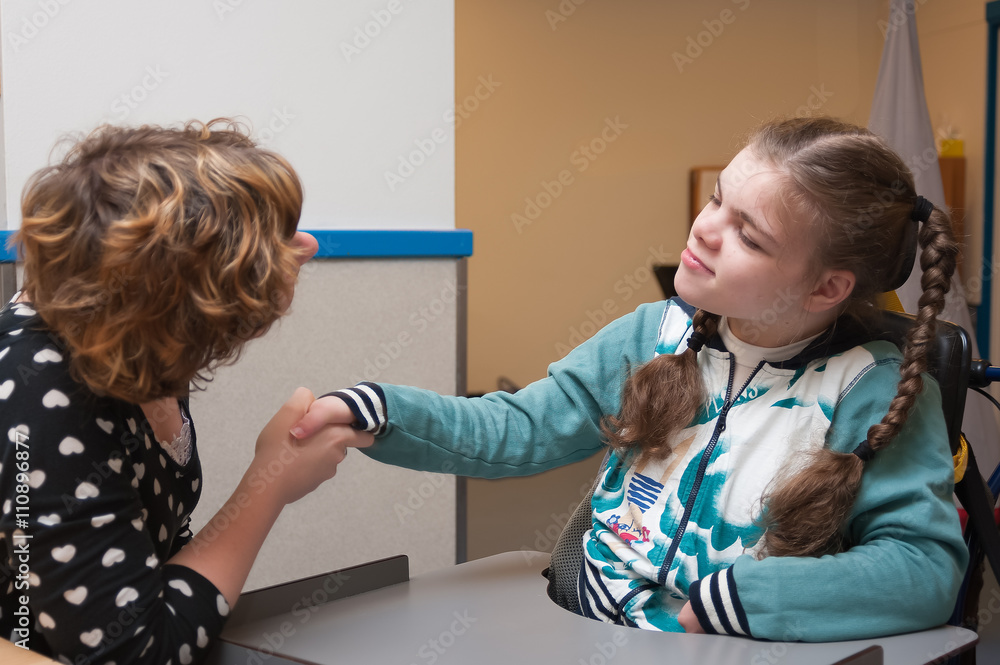 Disability a disabled person having play therapy / A disabled child in ...