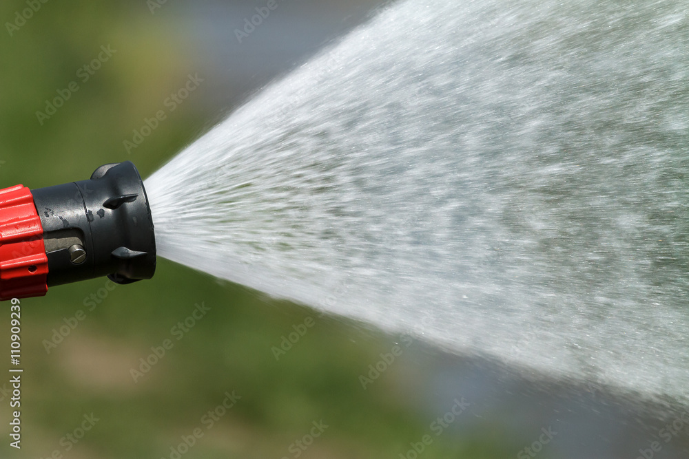 stream of water from a fire hose Stock Photo | Adobe Stock
