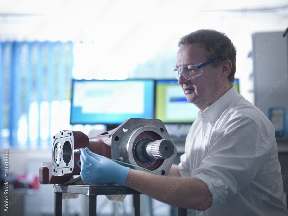 Engineer testing gear box in automotive test facility Stock Photo ...