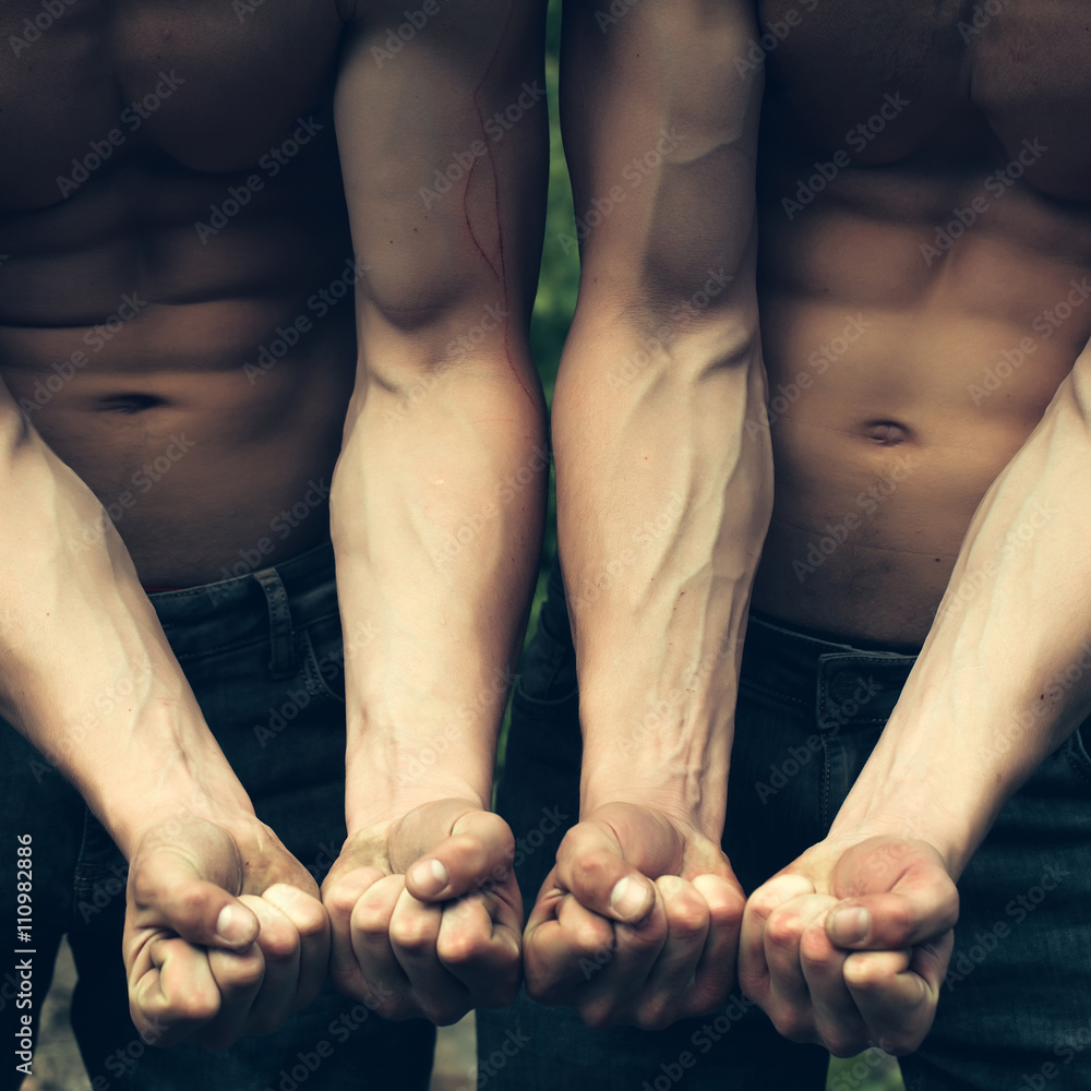 Muscular guys with veins on hands Stock Photo | Adobe Stock