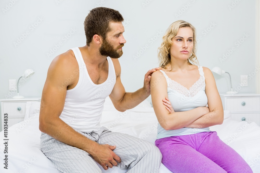 Young couple arguing on bed Stock Photo | Adobe Stock