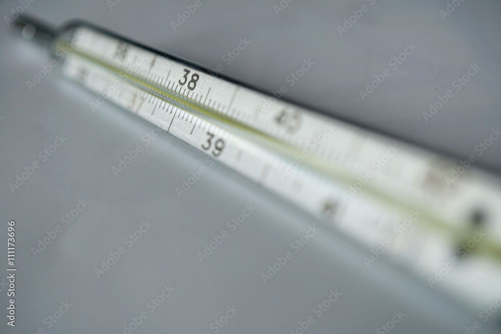 Isolated mercury thermometer displaying the measuring scale in Celsius ...
