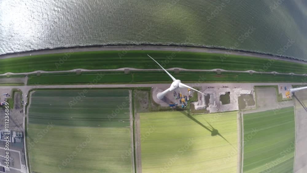 Aerial of wind turbine view from above top down bird eye view on green ...