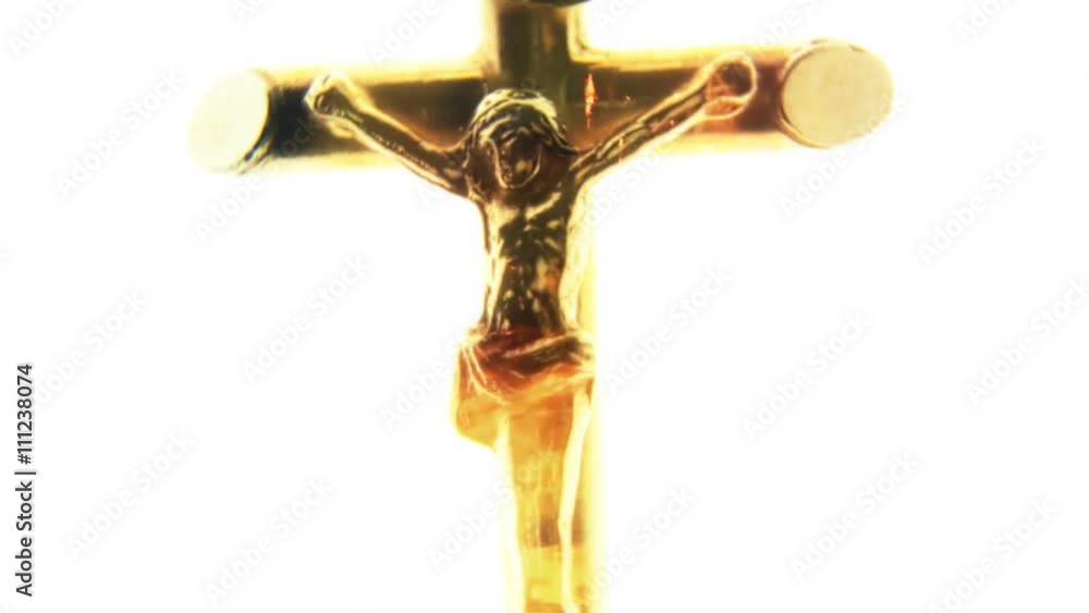 Zoom and rotate on a statue of Jesus Christ on the cross, isolated on ...