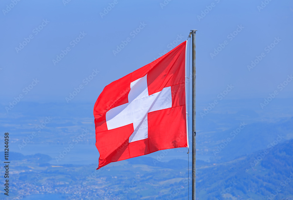 Swiss flag on the top of Mt. Stanserhorn Stock Photo | Adobe Stock