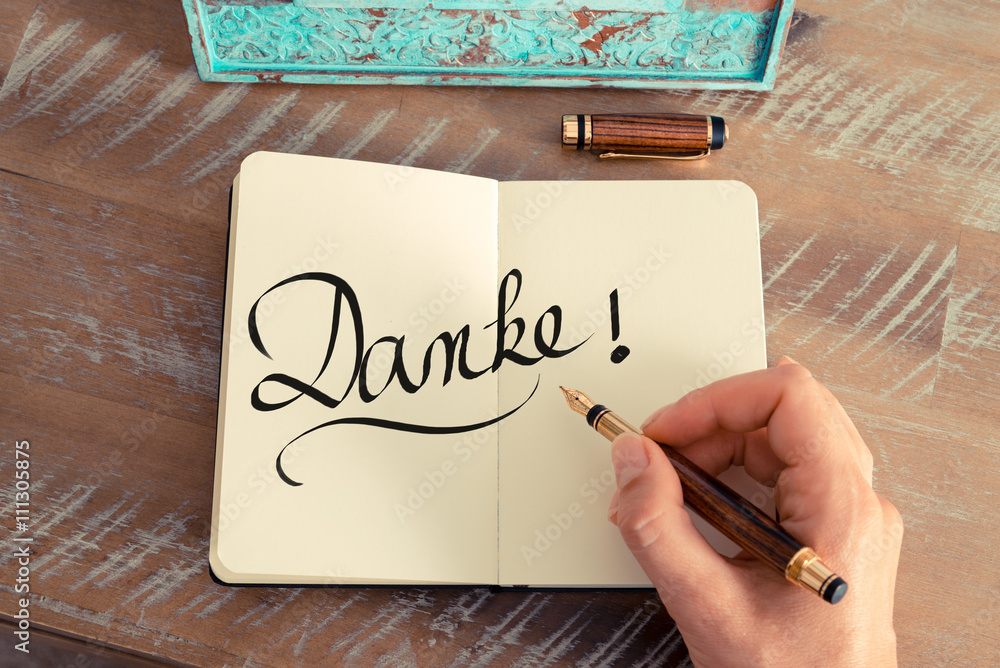 Handwritten text in German "Danke" - translation : Thank You Stock ...