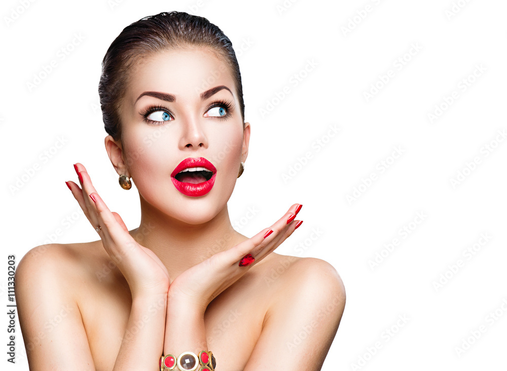Surprised woman. Beautiful model girl with perfect makeup Stock Photo ...