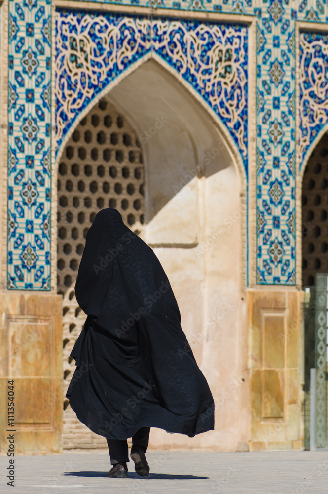 Muslim woman with traditional chador on the street Stock Photo | Adobe ...