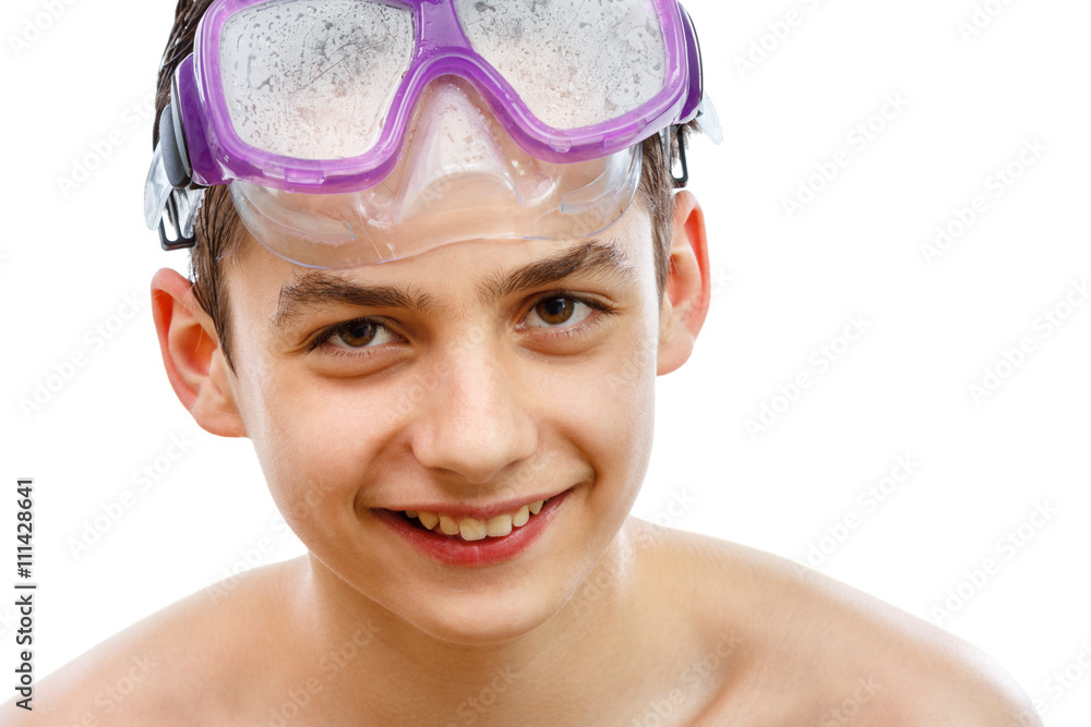 Boy diver in swimming mask with a happy face close-up portrait ...