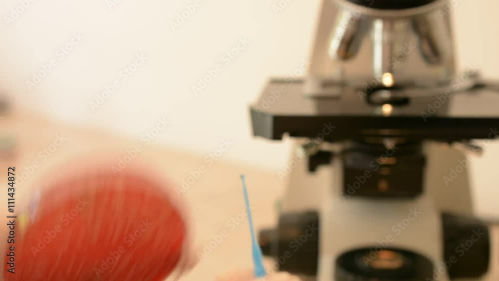 00:02 | 00:19 1× Laboratory doctor hands with sterile gloves using ...