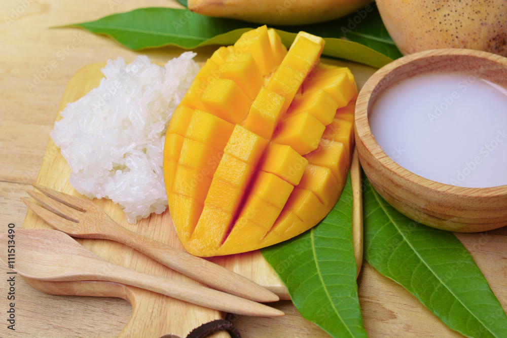mango with sticky rice on wooden tray. thai dessert made from mango ...