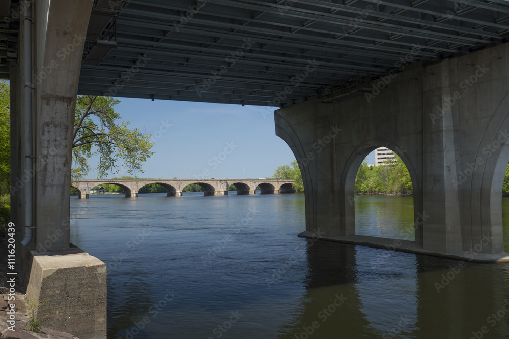 Springtime view under Founders Bridge over the Connecticut River, with ...