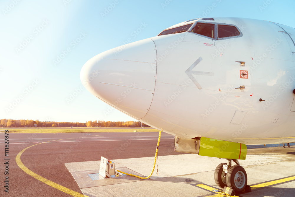 Front profile and cockpit windows of wide-body airplane. Stock Photo ...