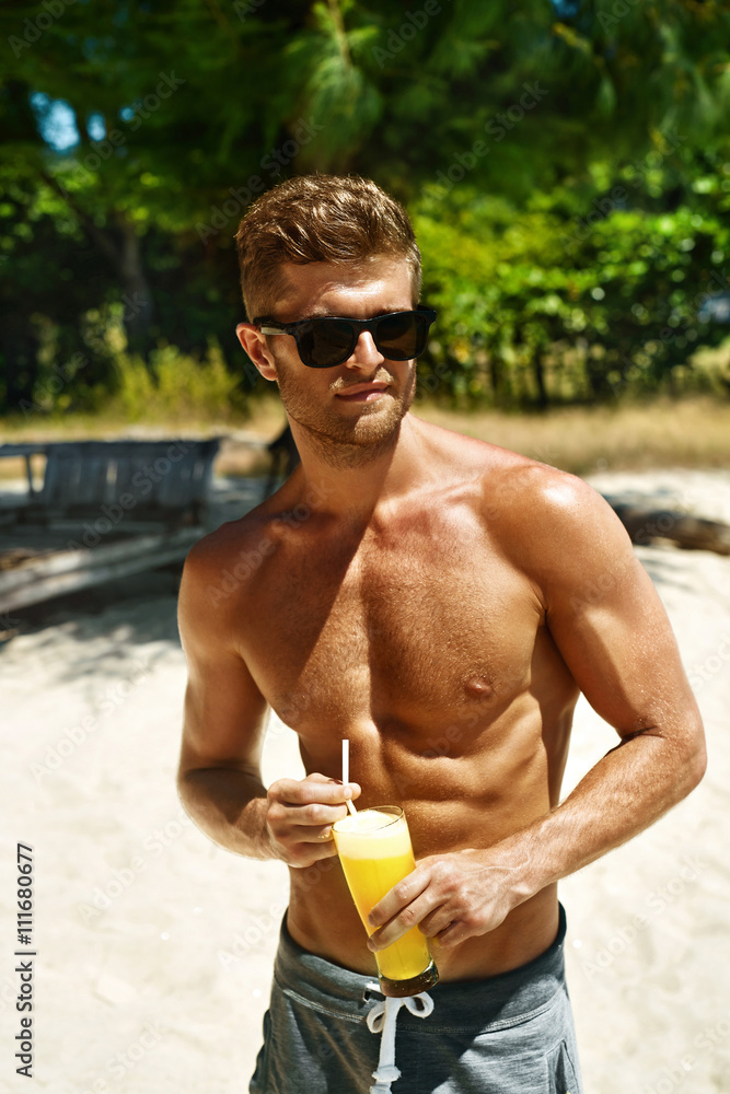 Summer Relax. Portrait Of Athletic Sexy Man With Muscular Body Drinking ...