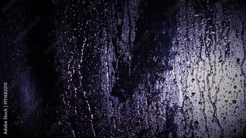 Heavy Rain Hitting a Window Pane. Rain hitting a window pane at night ...