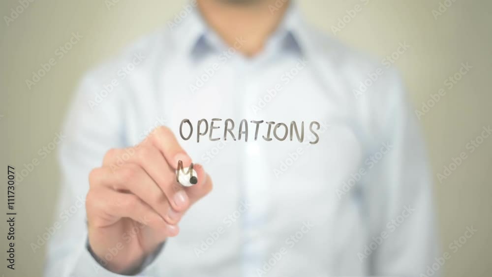 Operations Management , Man writing on transparent screen Stock ビデオ ...