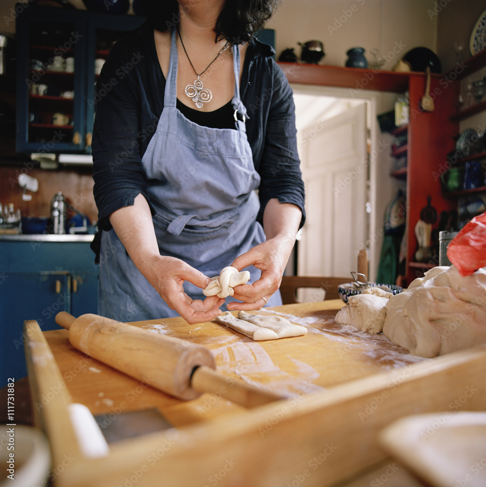 A woman making bread, Sweden. Stock Photo | Adobe Stock