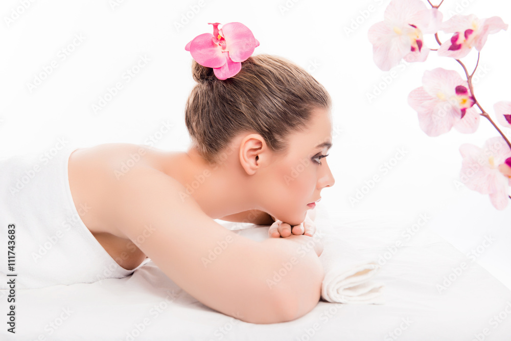 Side view photo of relaxed woman in spa salon with branch of orc Stock ...
