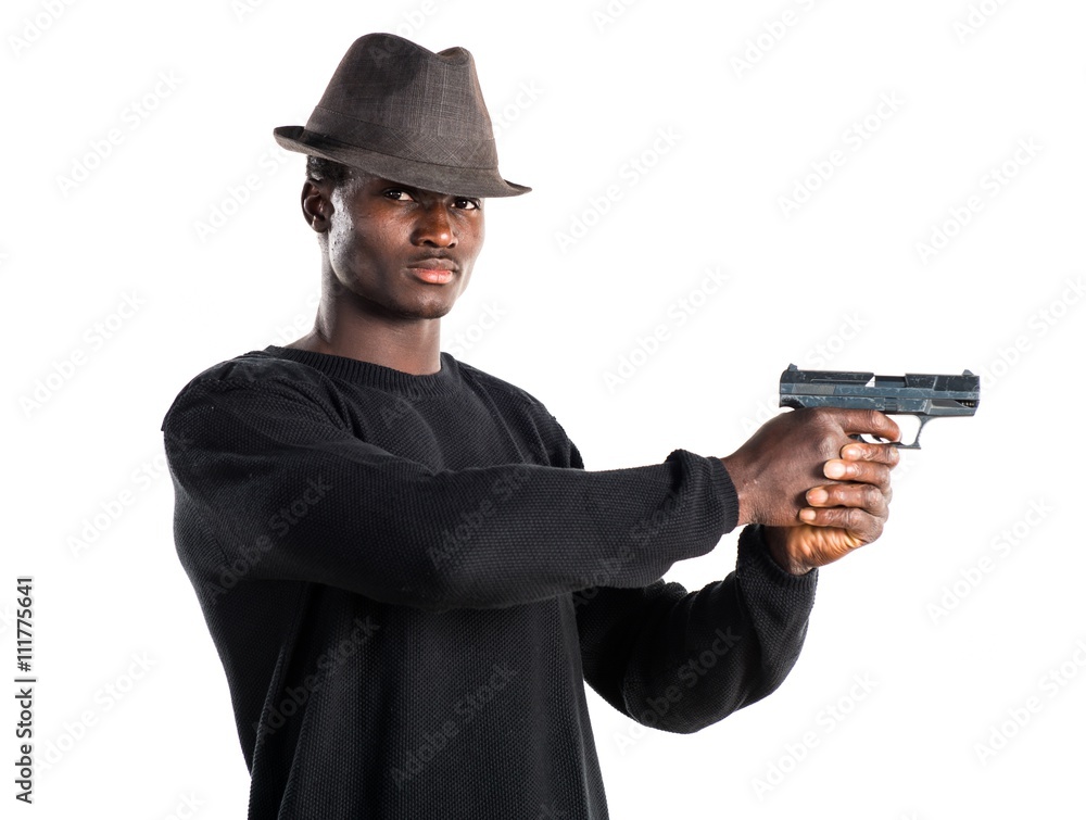 Black man holding a pistol Stock-Foto | Adobe Stock