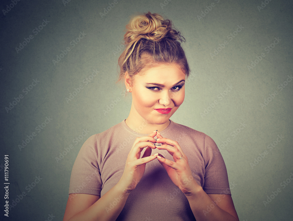 Sneaky, sly, scheming young woman plotting something. Negative human ...