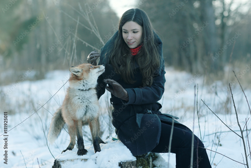 Girl and fox winter portrait Stock Photo | Adobe Stock