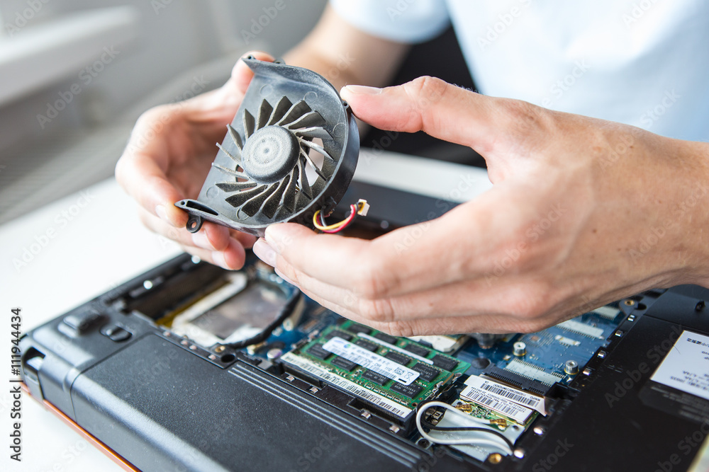 Computer literacy repair men hands, cooling, the hot temperature of the ...