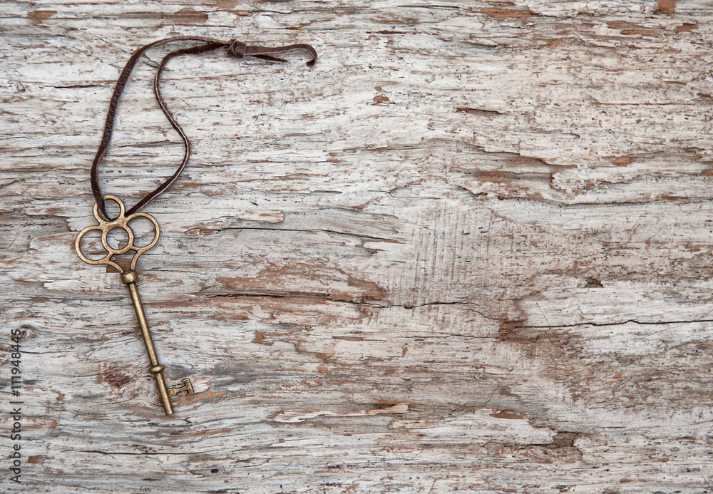 Vintage background with old key on the rude wood Stock Photo | Adobe Stock