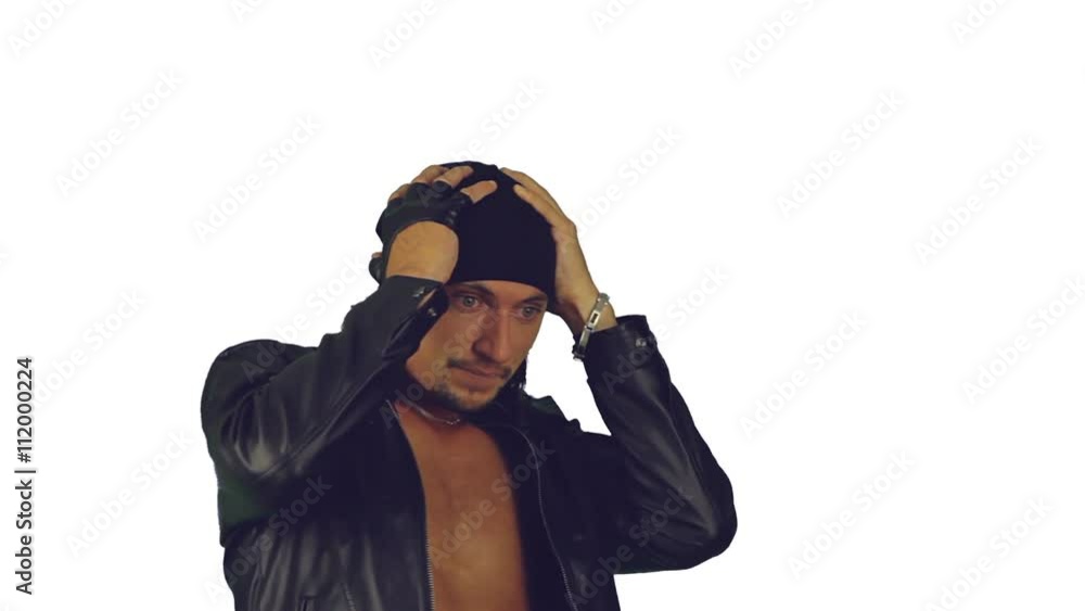 a man holding his head and suffers a headache or something happened ...