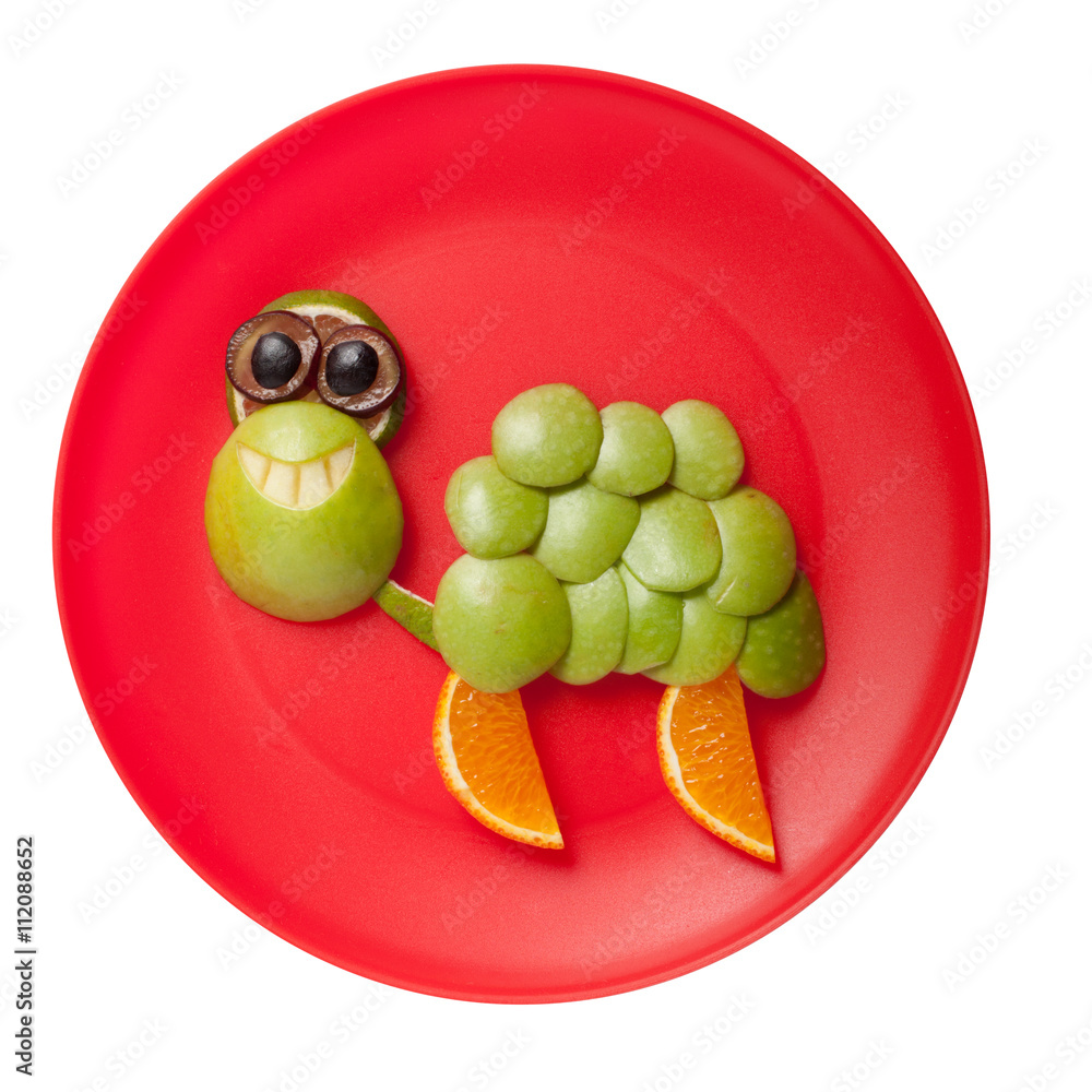 Funny smiling turtle made of fruits on plate Stock Photo | Adobe Stock