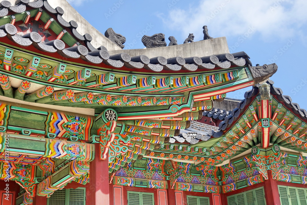 Korean traditional architecture. Roof detail of palace in Seoul. These ...