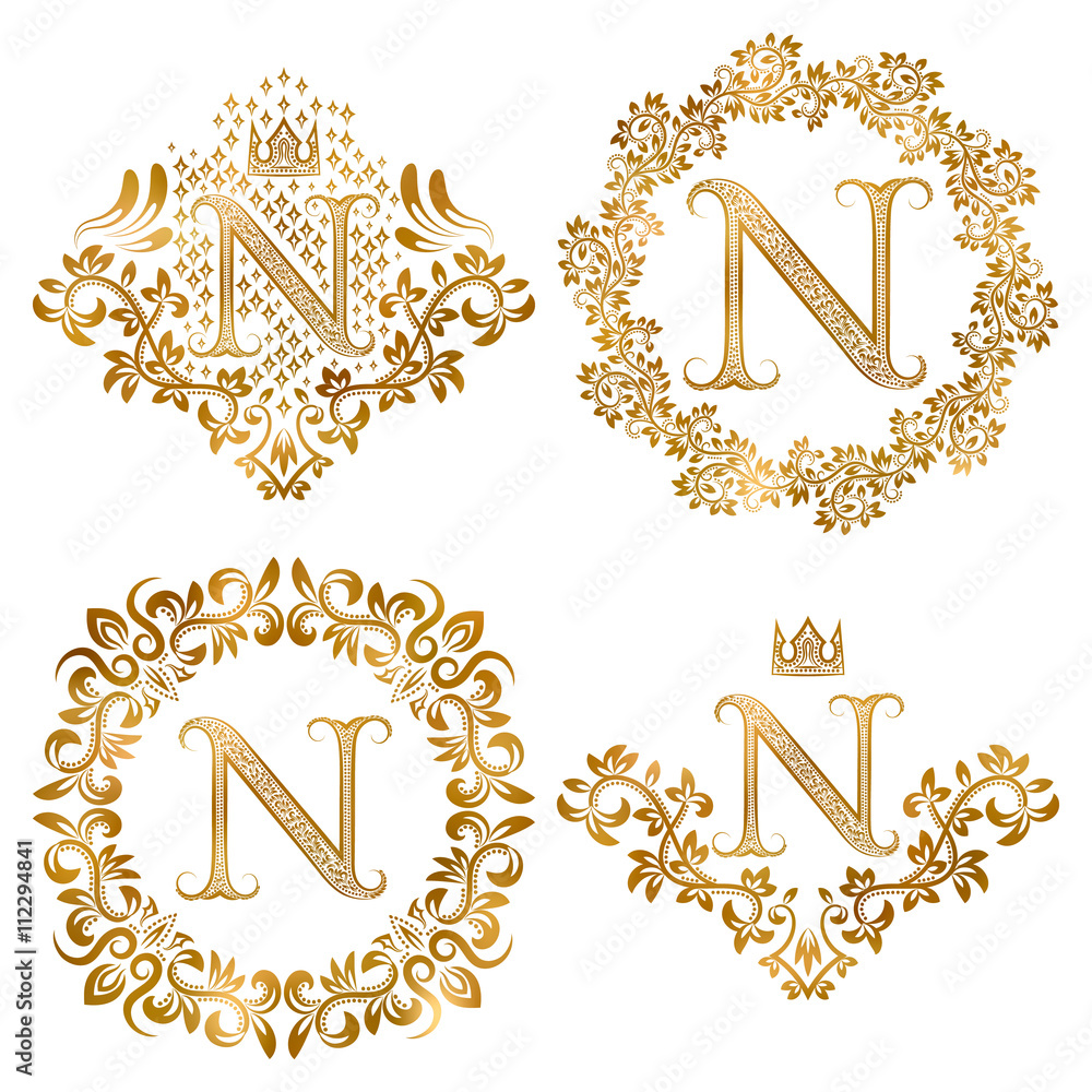 Golden letter N vintage monograms set. Heraldic monogram in coats of ...