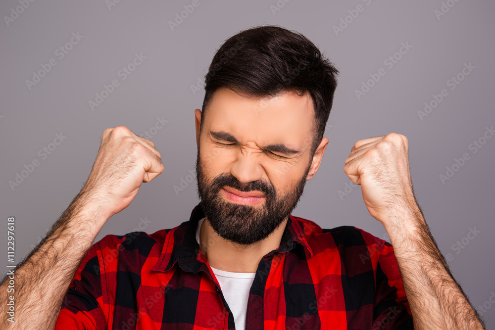 Young man with grimace on his face suffering from strong pain Stock ...