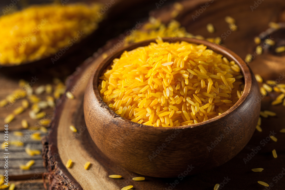 Raw Organic Yellow Saffron Rice Stock Photo | Adobe Stock